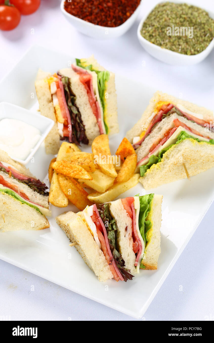 A club sandwich on a rustic table - Fresh toasted panini sandwich Stock ...