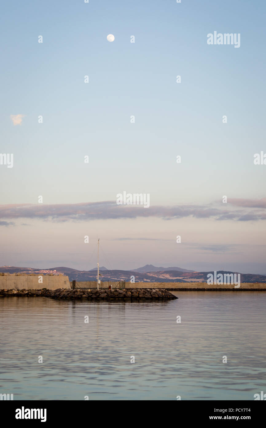Port of Marina with the moon Stock Photo - Alamy