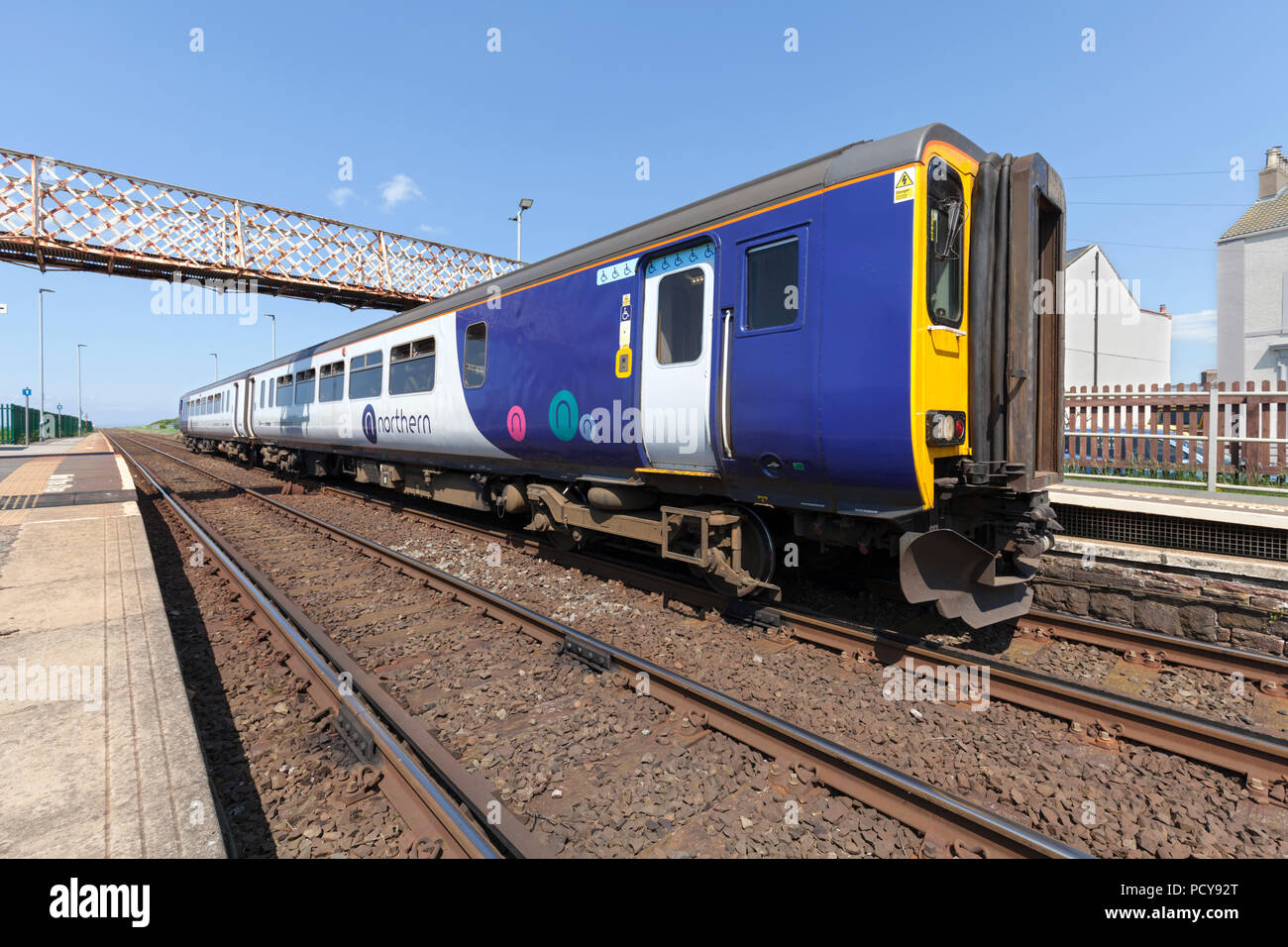 A Northern rail class 156 sprinter train at Harrington railway station ...