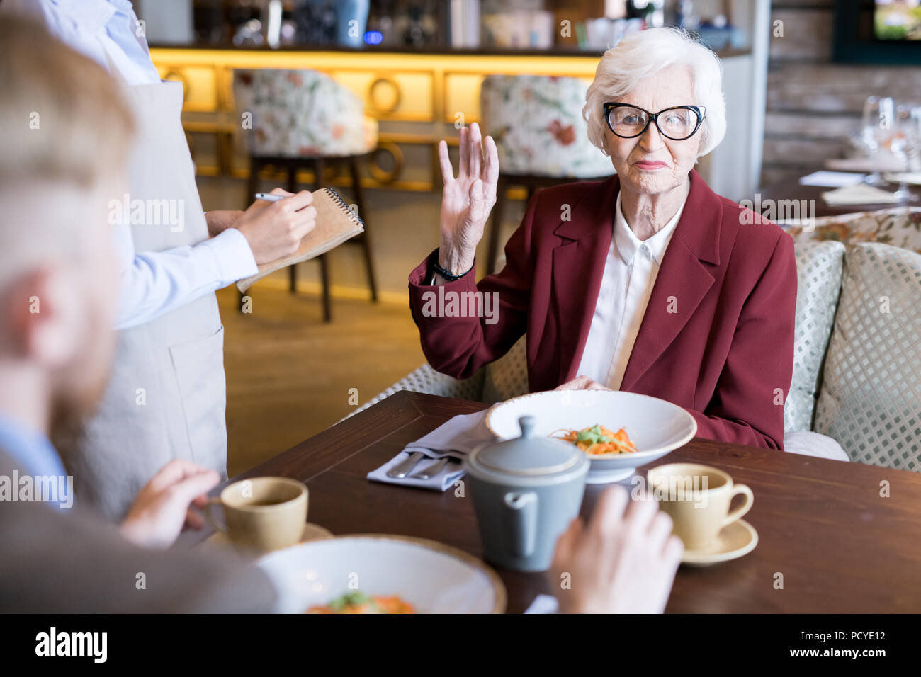 Family dinner at cafe Stock Photo - Alamy