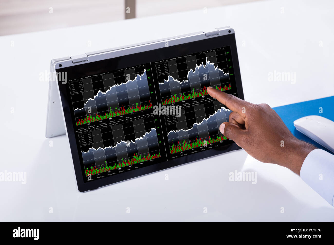 Businessman pointing at a chart hi-res stock photography and images - Alamy