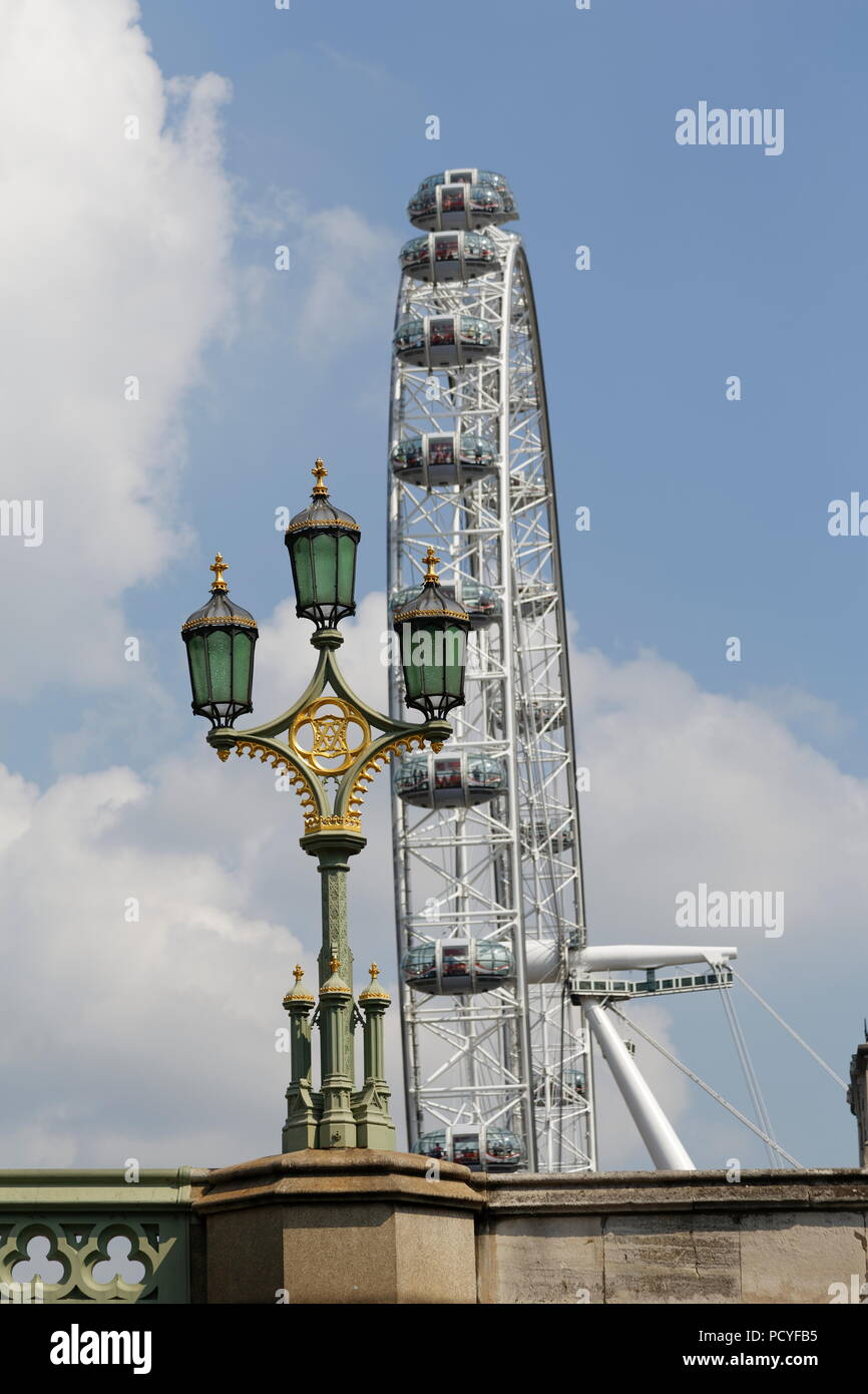 Ornate lamp post and London Eye from Westminster Bridge South Bank ...