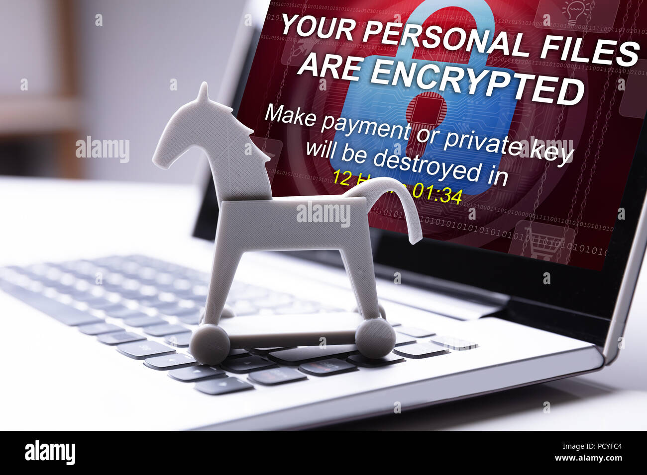 Close-up Of Trojan Horse Icon And Laptop Screen Showing Personal Files ...