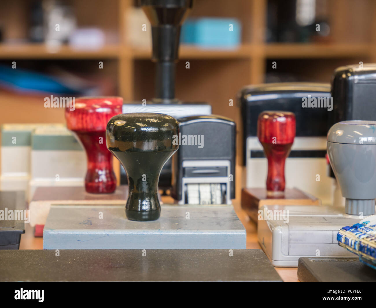 Bunch of old office stamp on a desk Stock Photo - Alamy