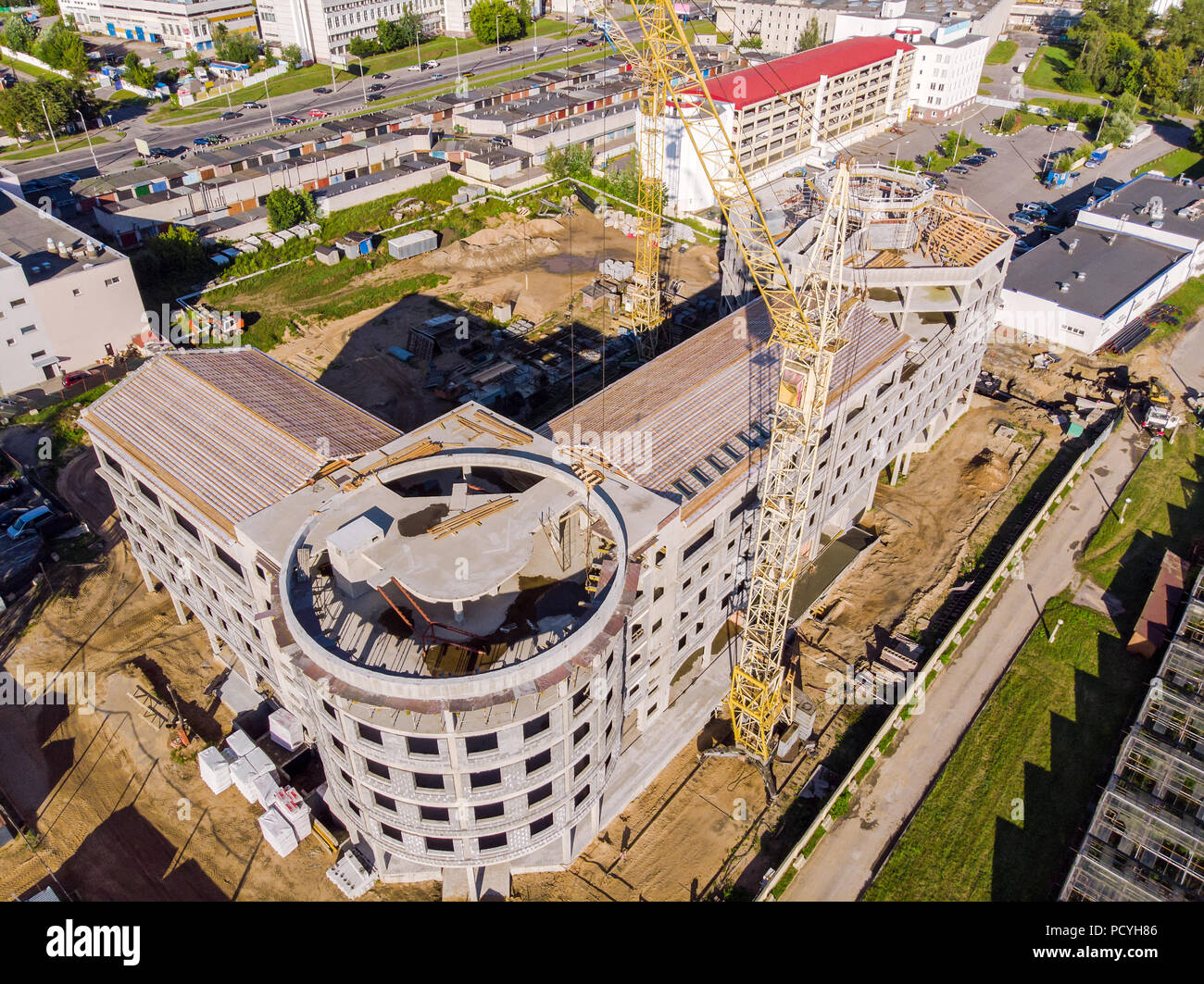 Flying above construction site cranes hi-res stock photography and ...