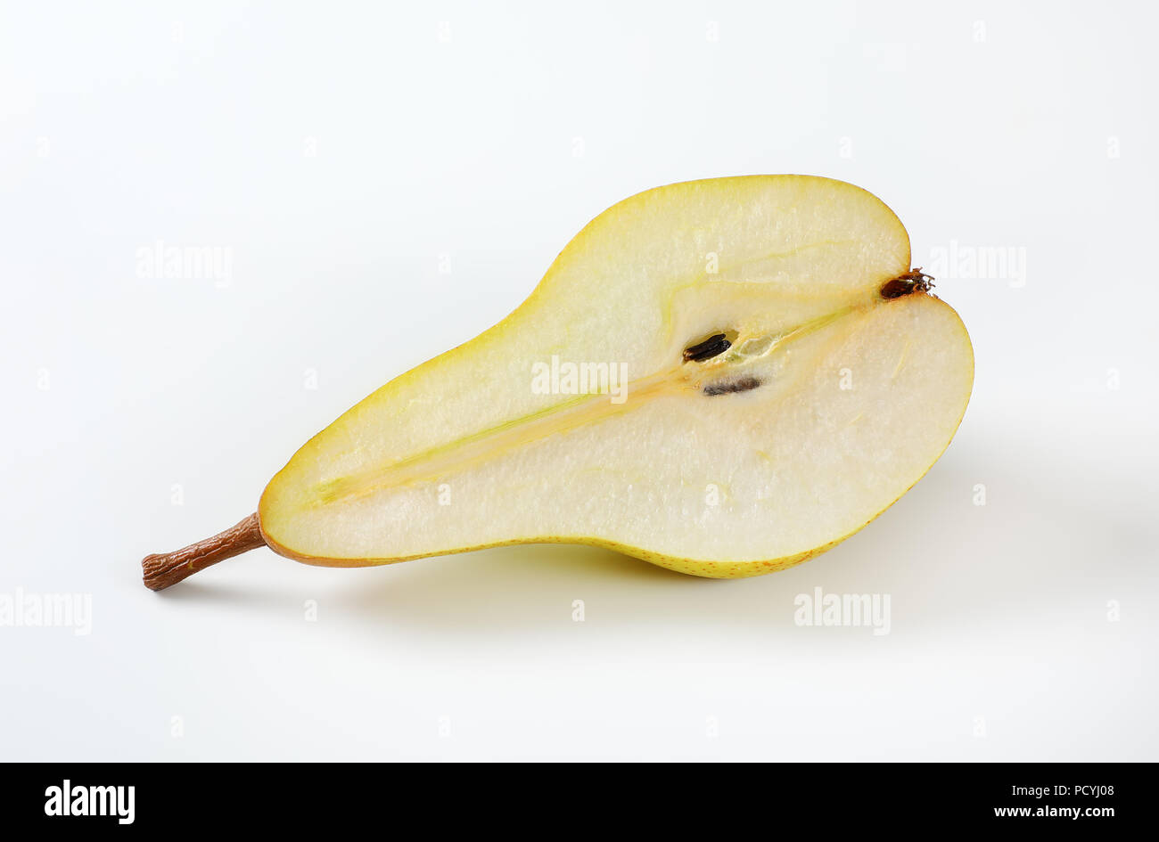 Half cut pear hi-res stock photography and images - Alamy