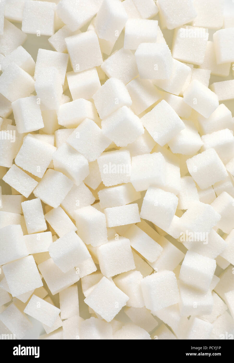 pile of white sugar cubes - full frame Stock Photo - Alamy