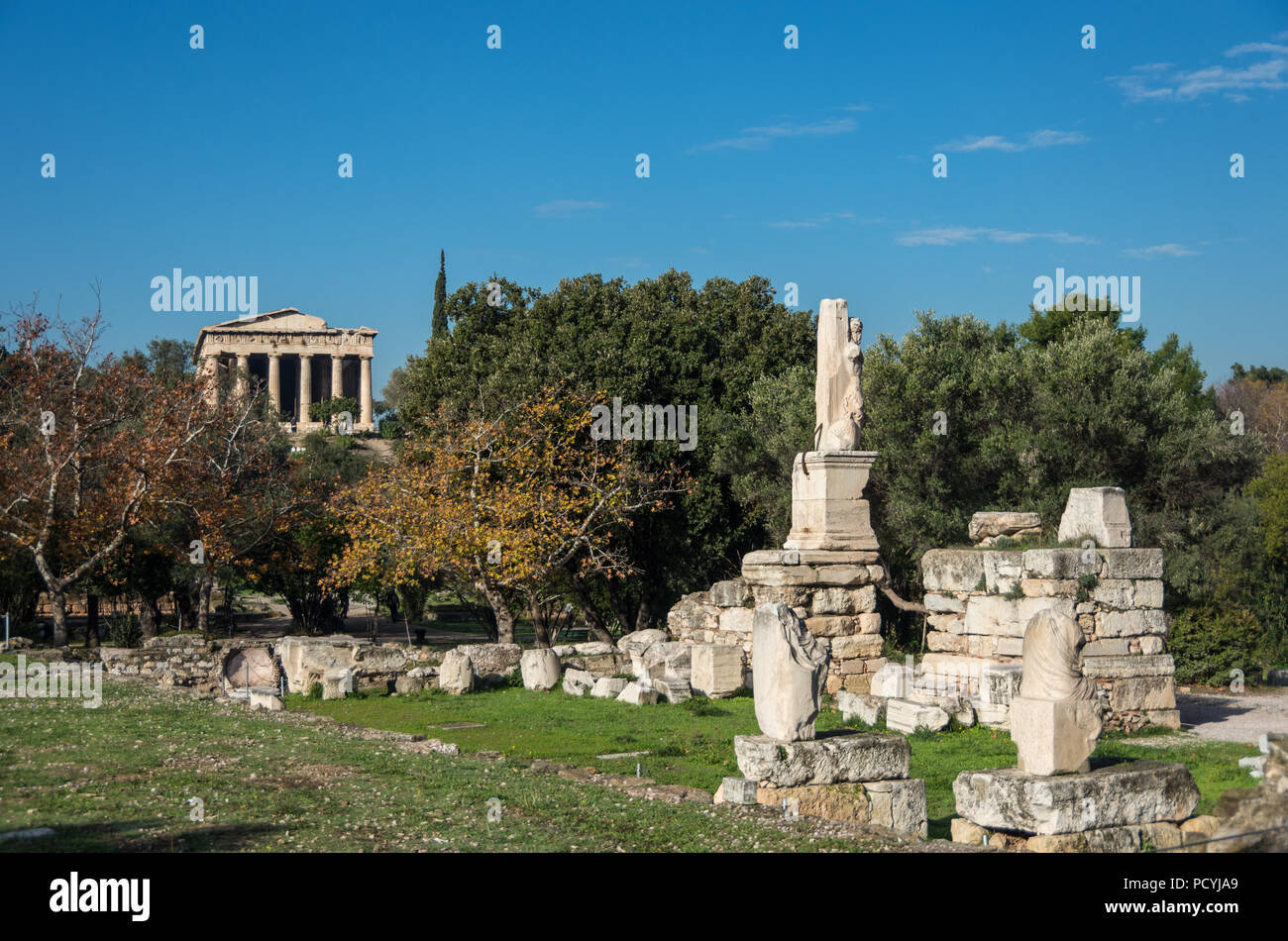 Odeon of Agrippa statues with Temple of Hephaestus at background ...