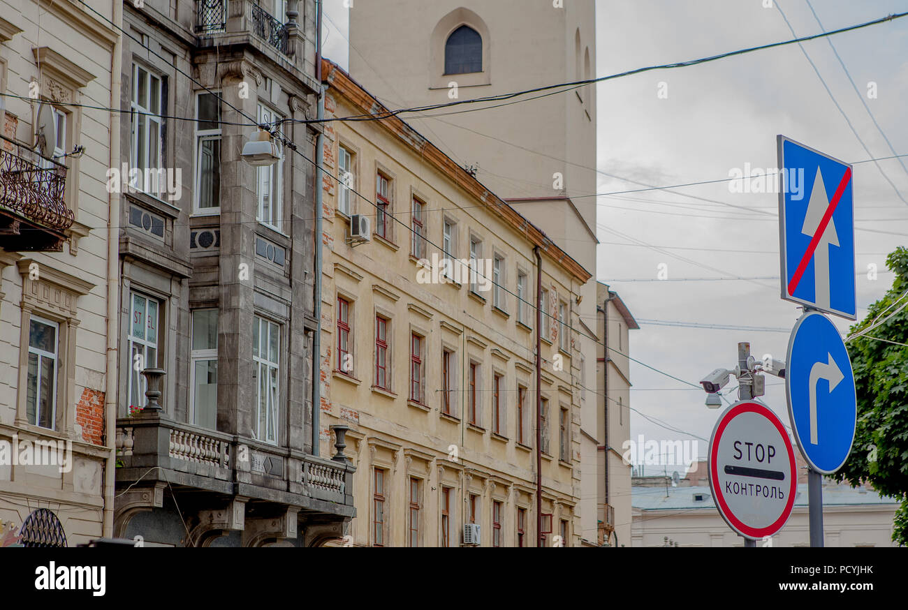 Many road signs in the background of the old city Stock Photo - Alamy