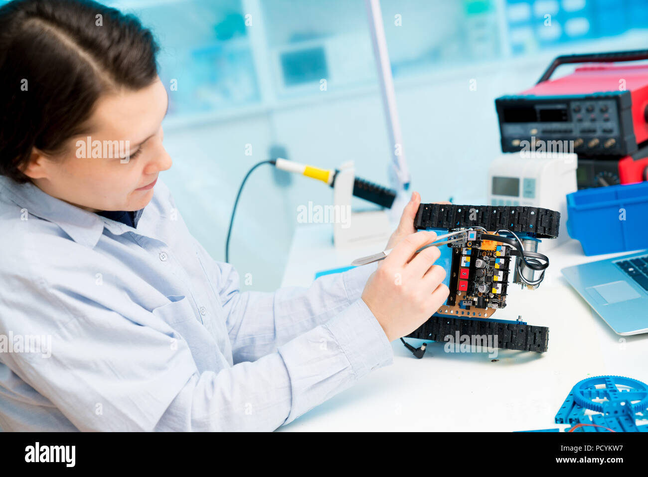 Young woman in CNC and robotics laboratory Stock Photo - Alamy