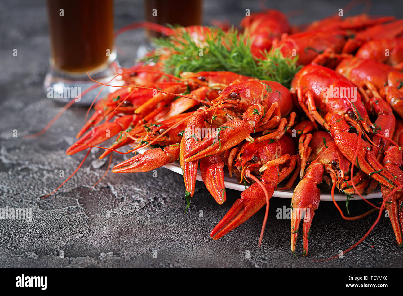 Crayfish. Red boiled crawfishes on table in rustic style, closeup ...