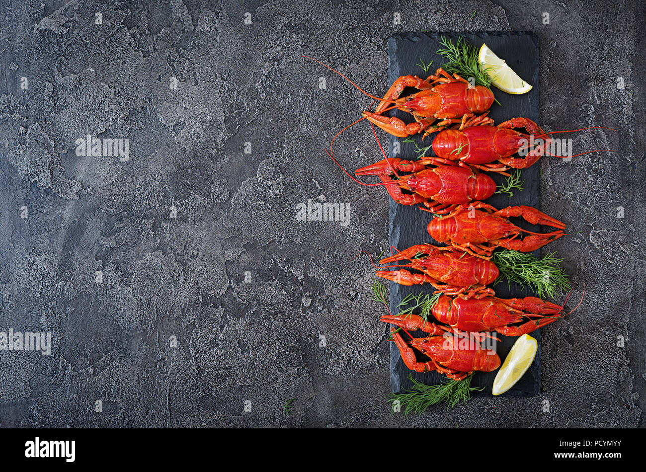 Crayfish. Red boiled crawfishes on table in rustic style, closeup ...