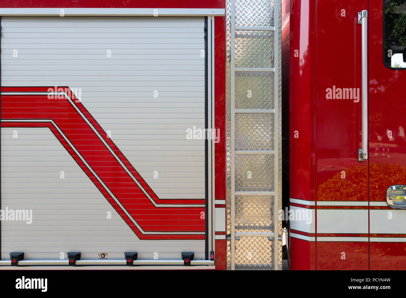 side of a fire truck as background Stock Photo - Alamy