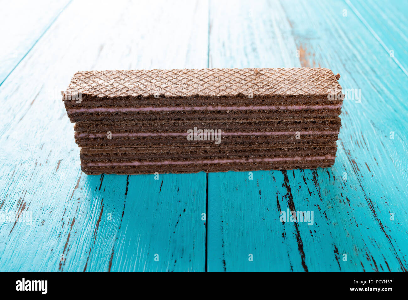 vanilla flavor wafer blocks on blue background Stock Photo - Alamy