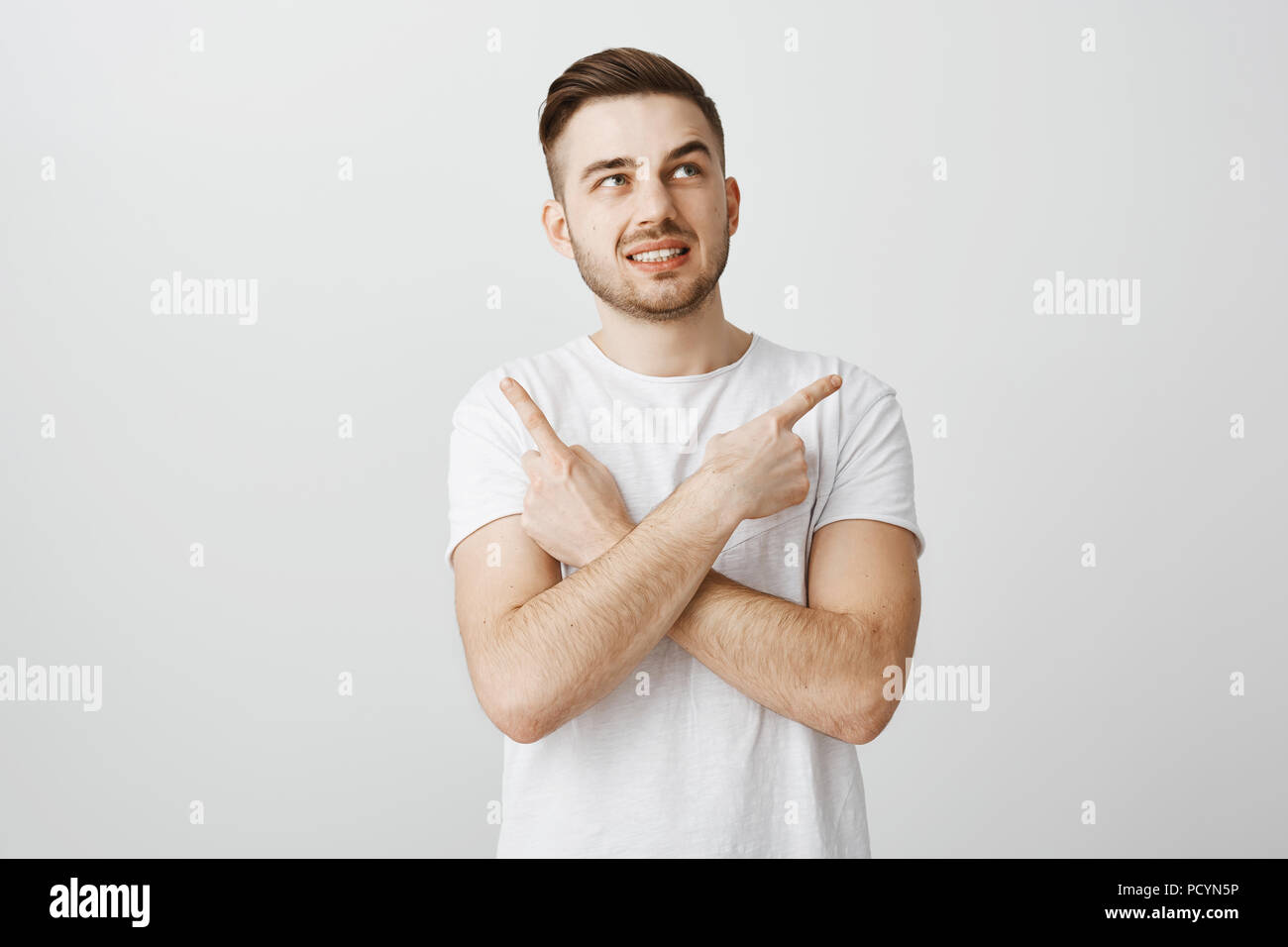 Unsure worried guy feeling nervous making wrong decision standing ...