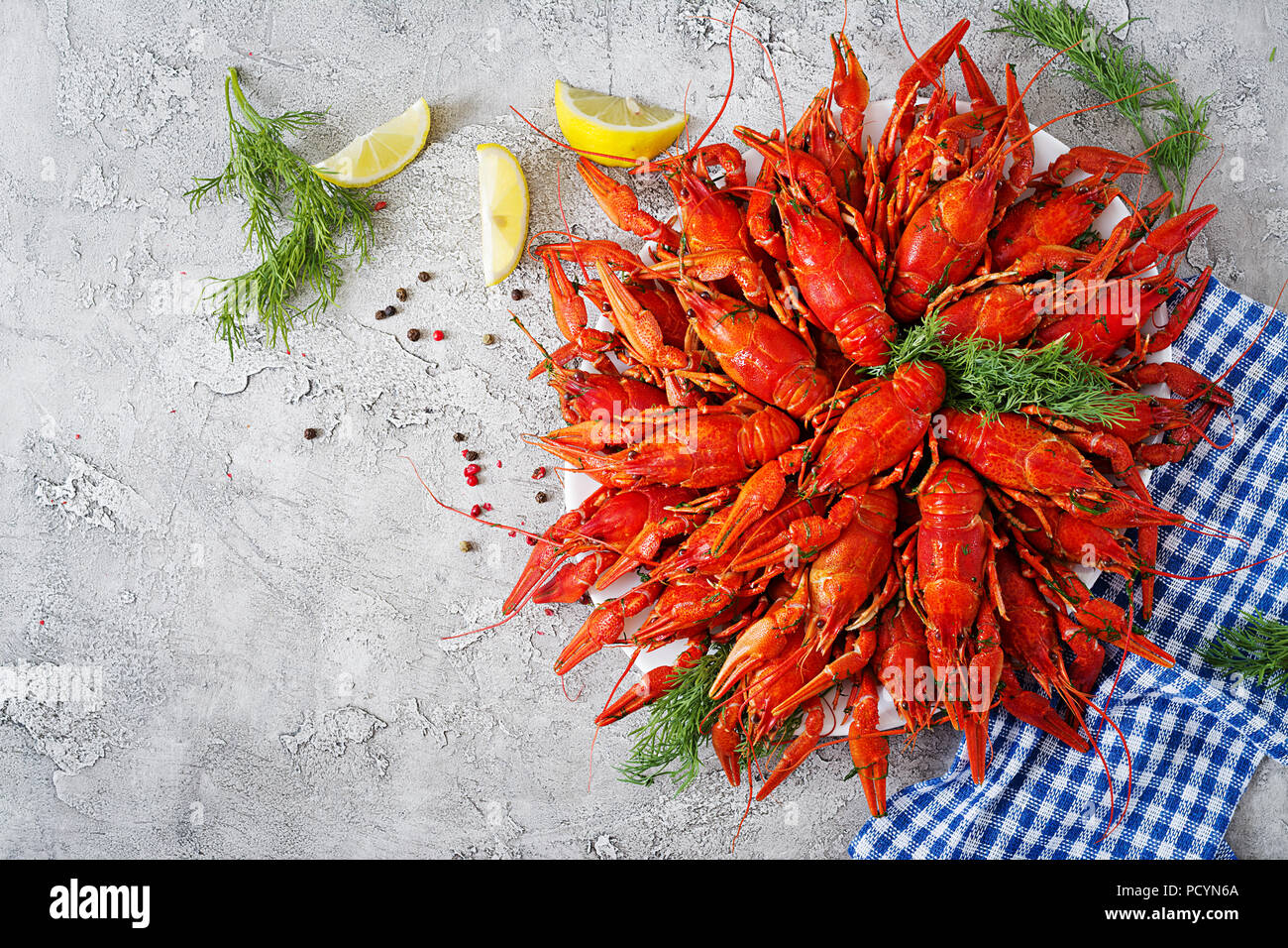 Crayfish. Red boiled crawfishes on table in rustic style, closeup ...