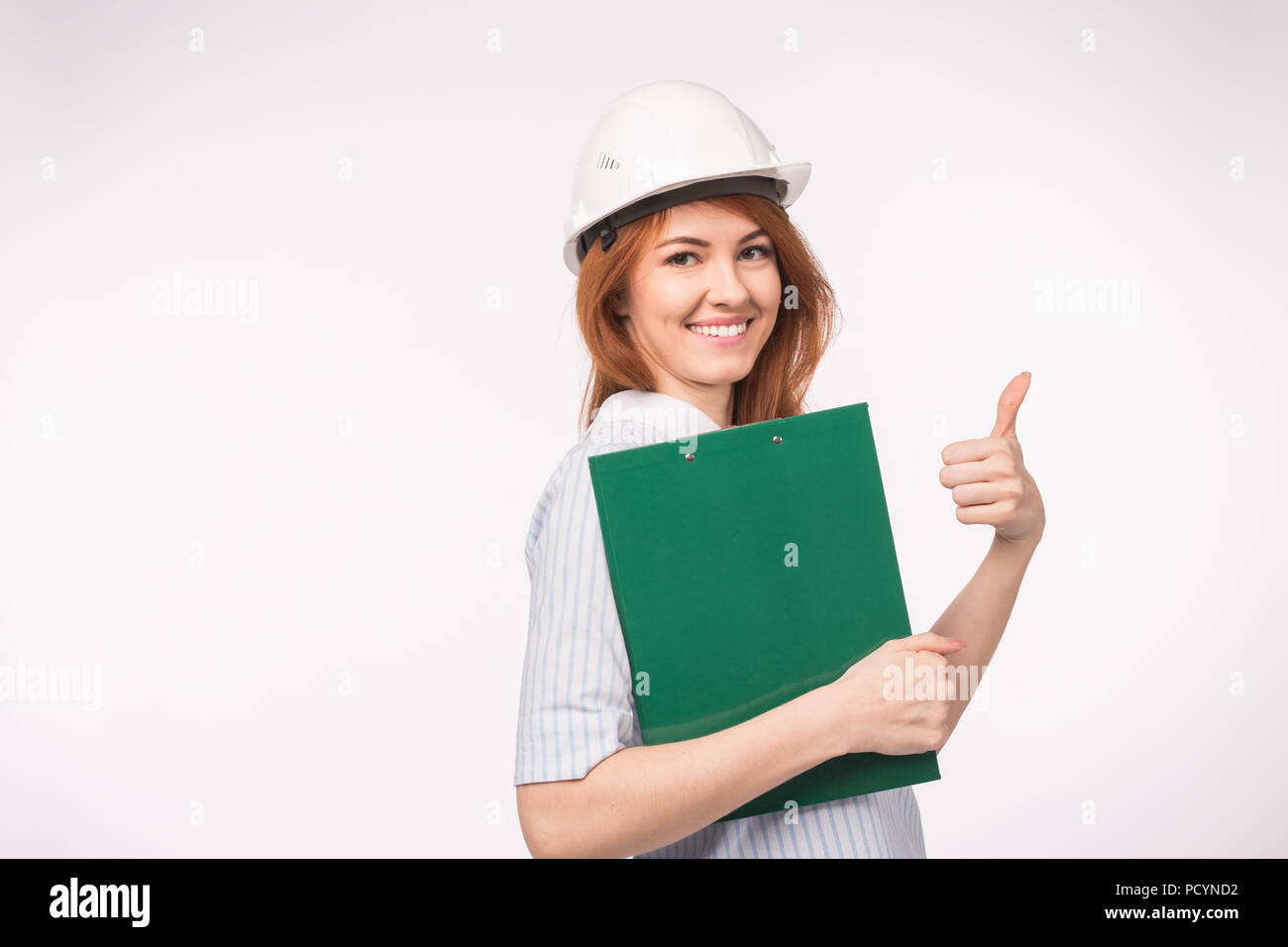 Architect, worker and realtor concept - woman builder or engineer ...