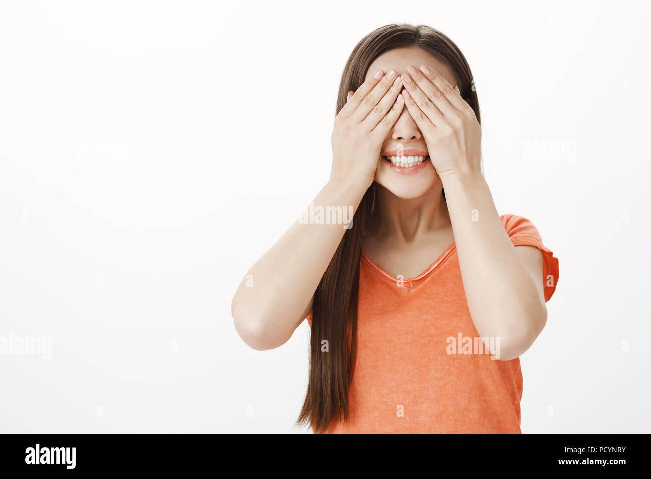 Can I open eyes already. Portrait of positive impatient european female ...