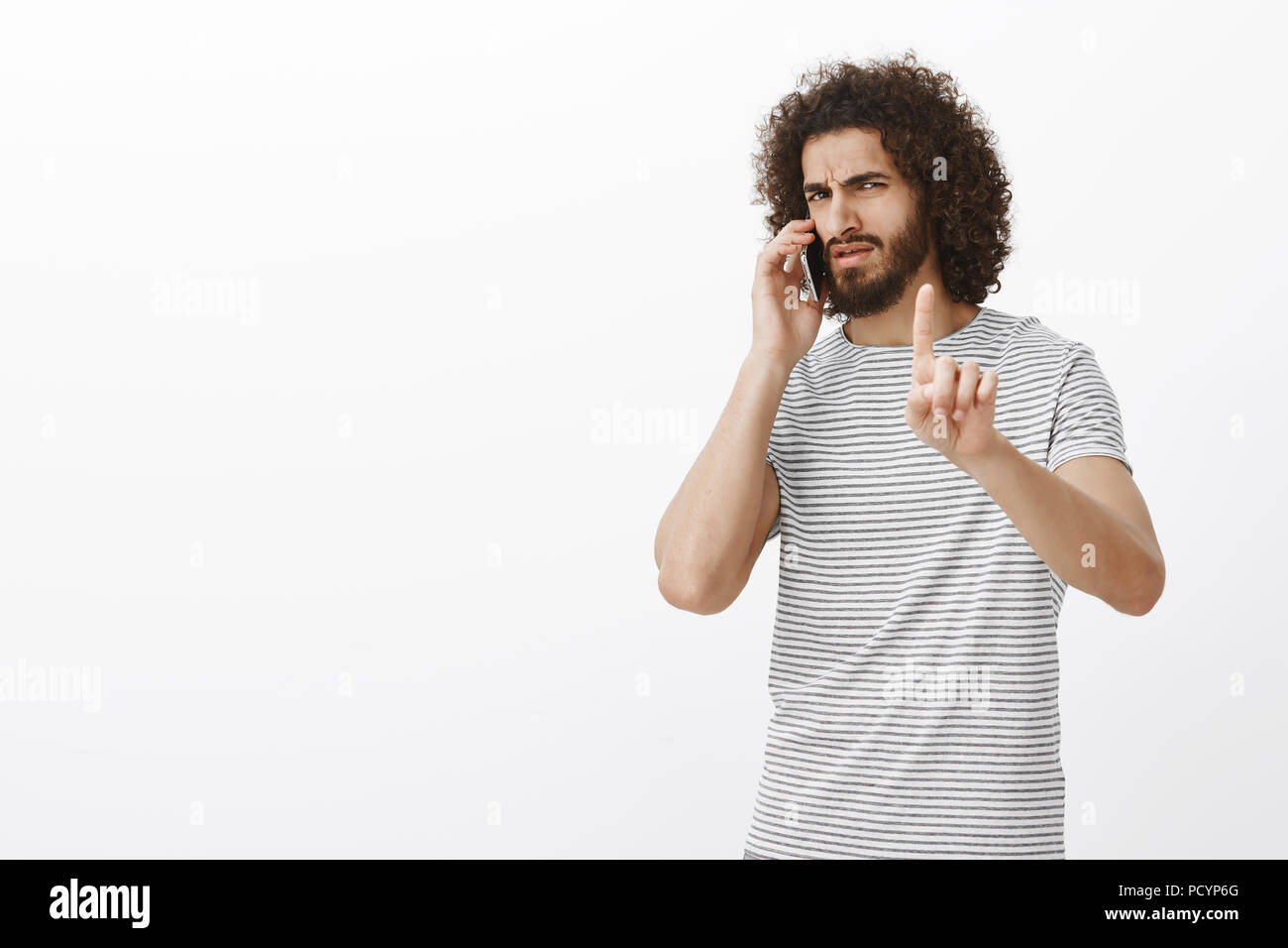 Wait second, it is importrant call. Bossy masculine attractive man with ...