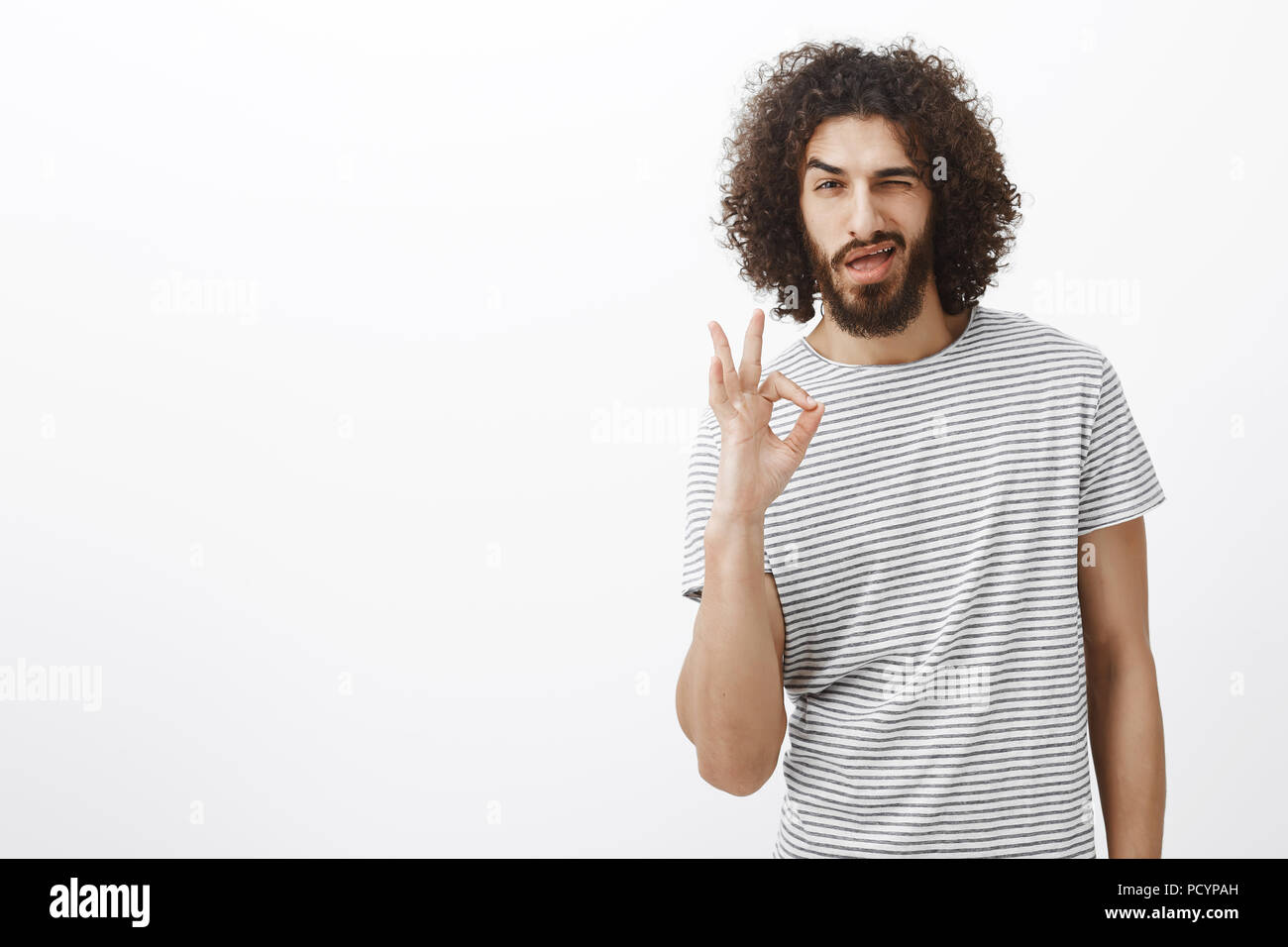 Winking guy beard hairstyle hi-res stock photography and images - Alamy