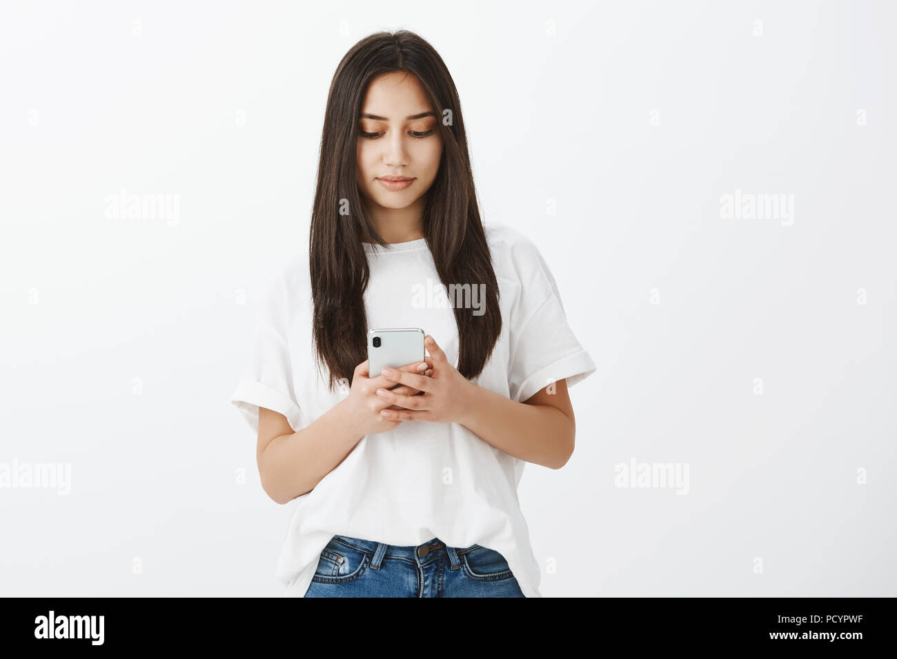 Writing important message to girlfriend. Calm good-looking european ...