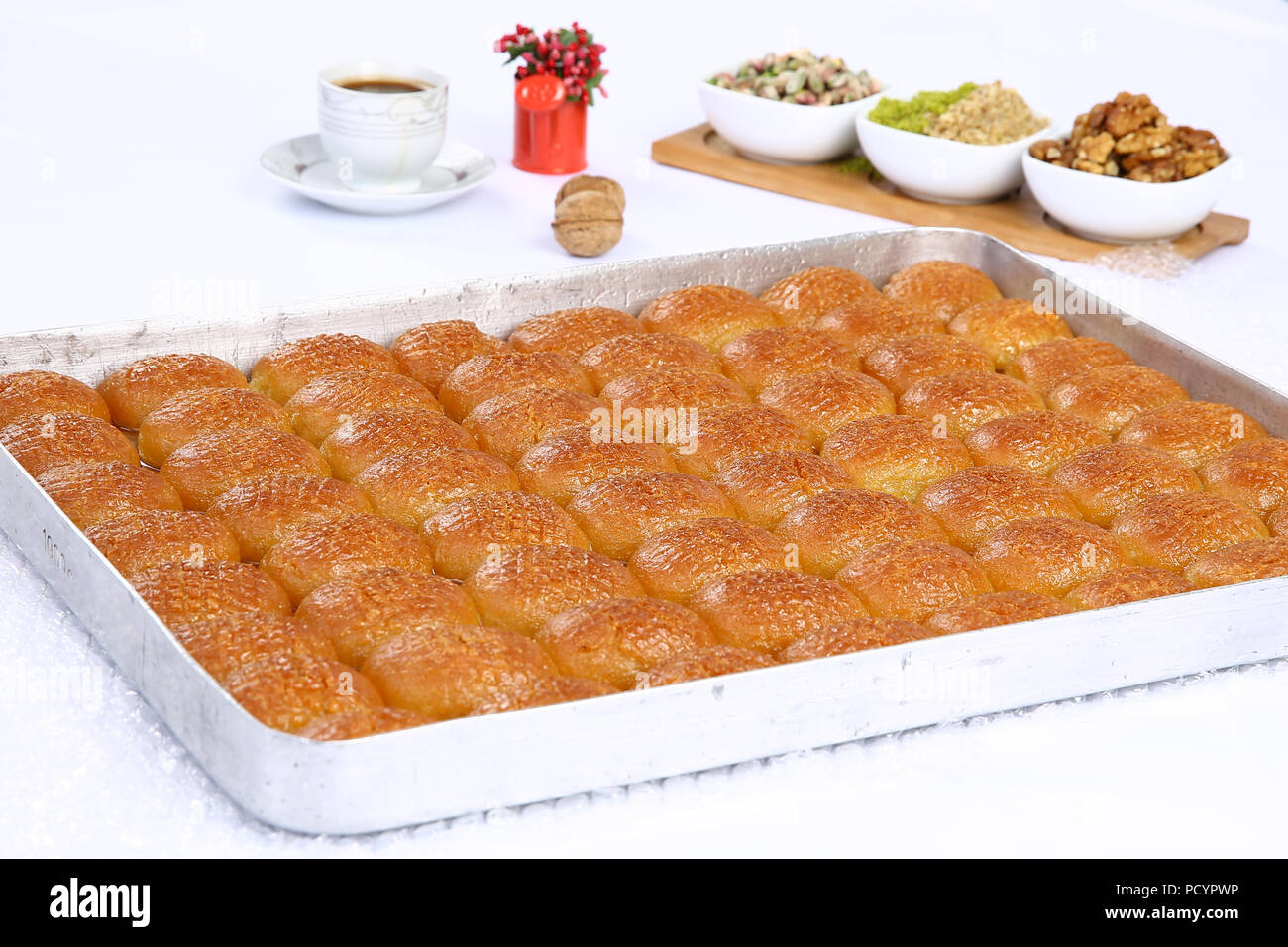 Delicious turkish dessert sekerpare with coconut powder Stock Photo - Alamy
