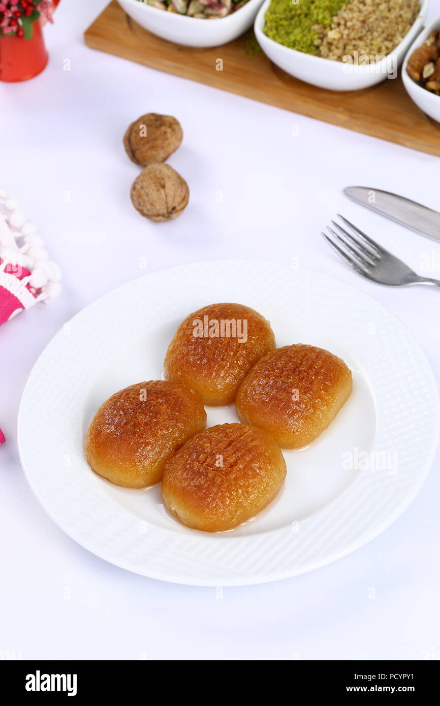 Delicious turkish dessert sekerpare with coconut powder Stock Photo - Alamy
