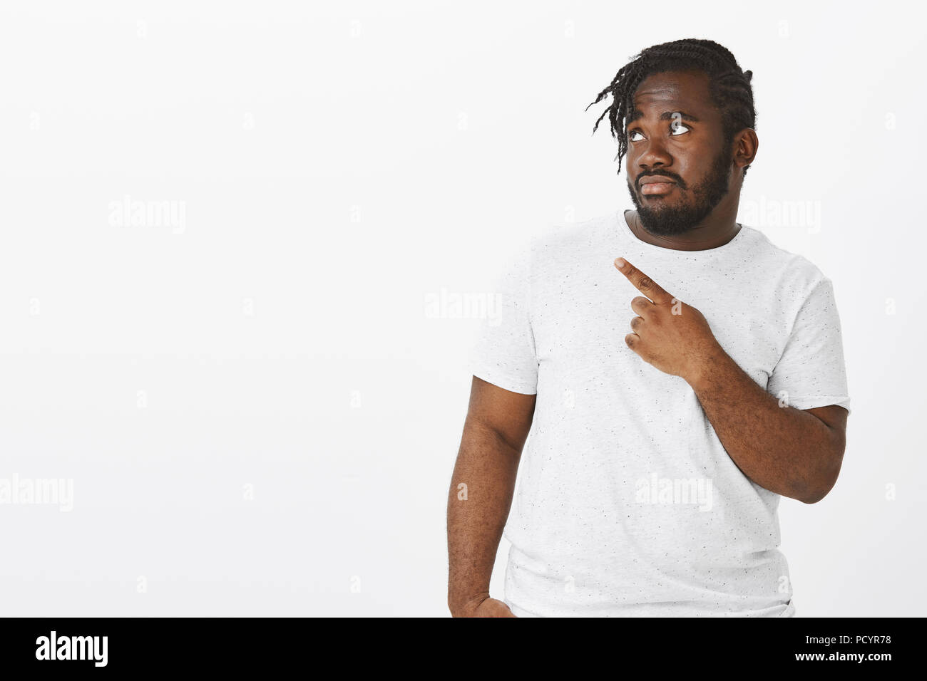 This is unimpressive. Portrait of indifferent uninterested plump male ...