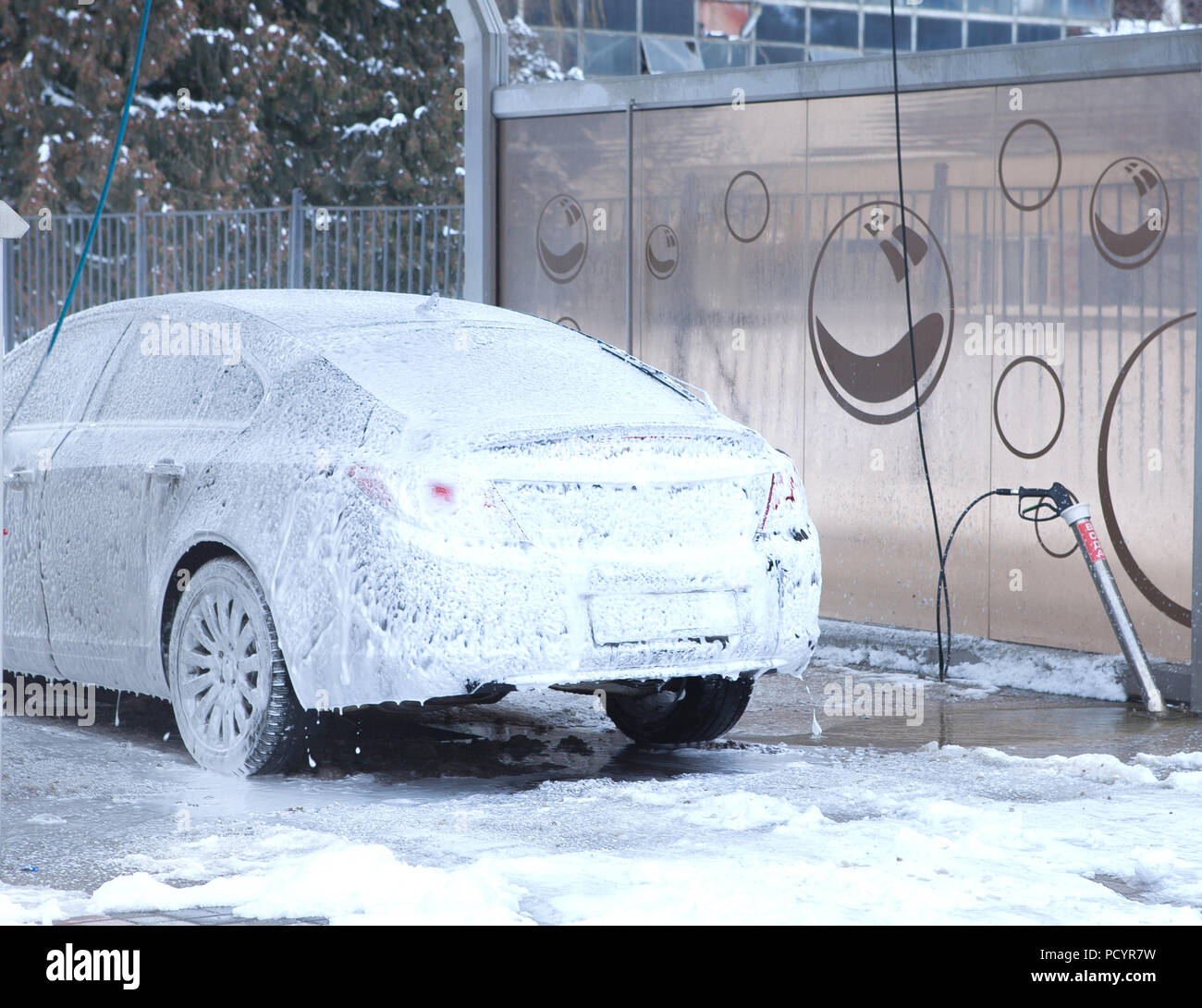 Car washing concept. Car in foam Stock Photo - Alamy