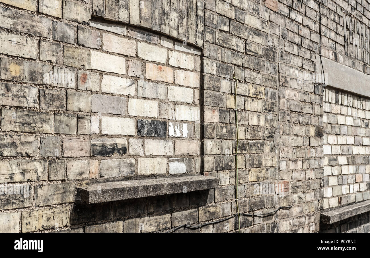 Old english terraced house seen with its bricked-up windows, due to the ...