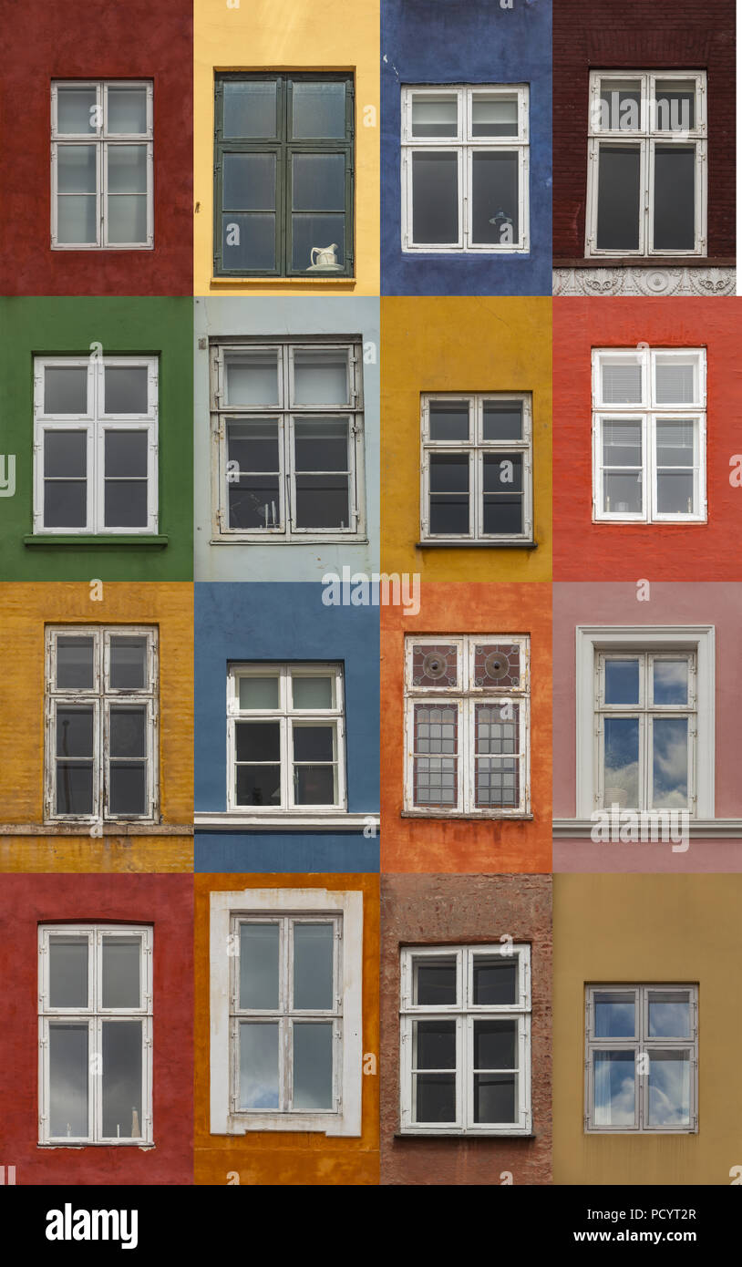 Windows on the colorful facades from Nyhavn harbour, Copenhagen ...