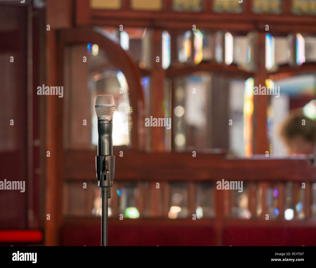 Empty Stage With Mic And Guitar