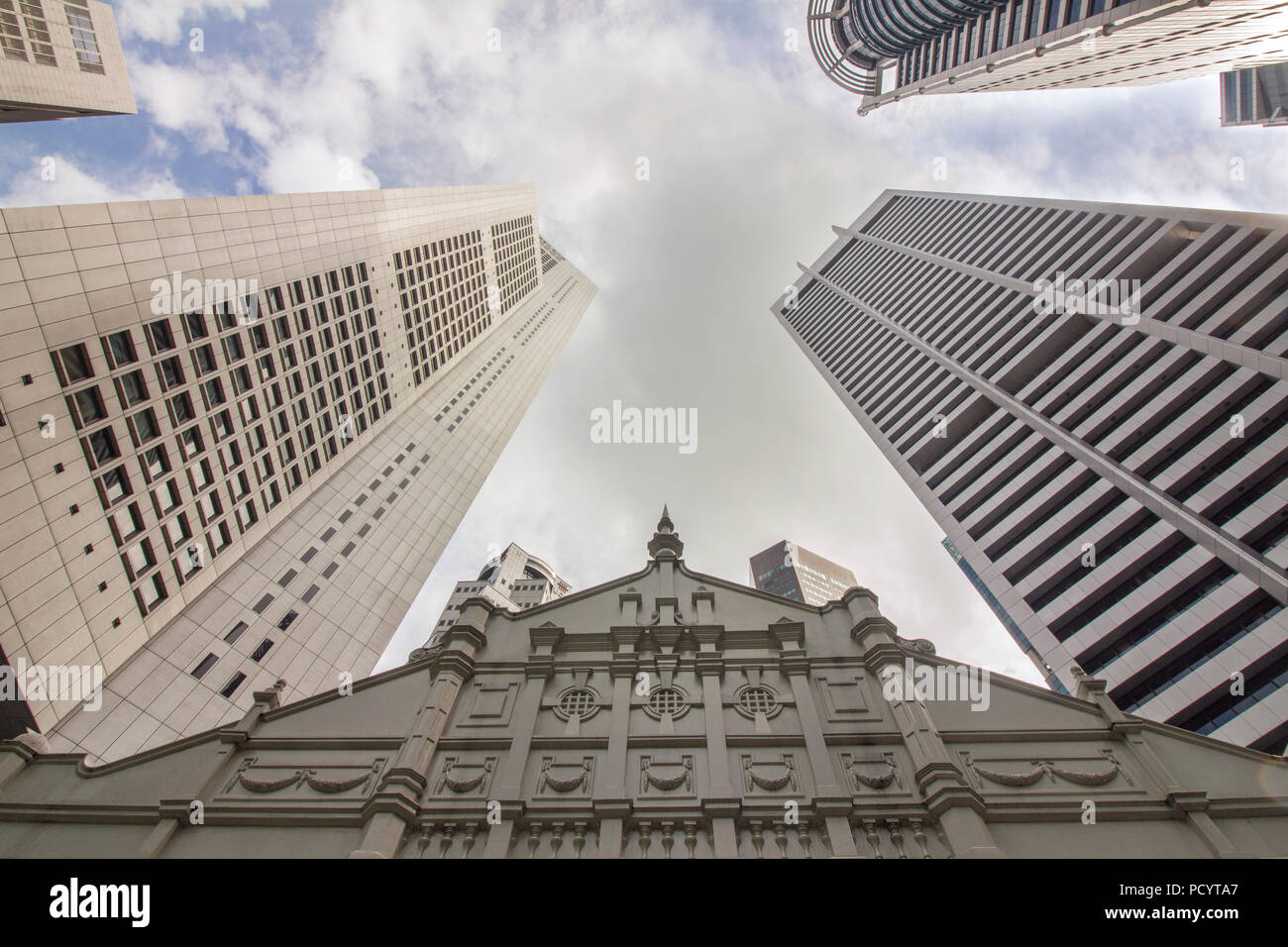 The Raffles Place MRT subway building surrounded by corporate towers ...