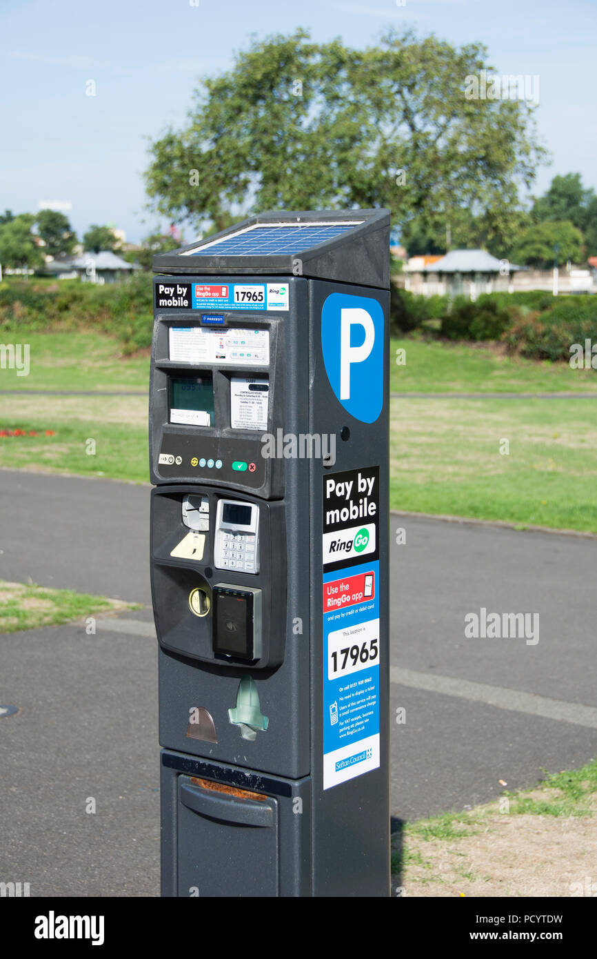 Parking signs and machines on streets of Southport Stock Photo - Alamy