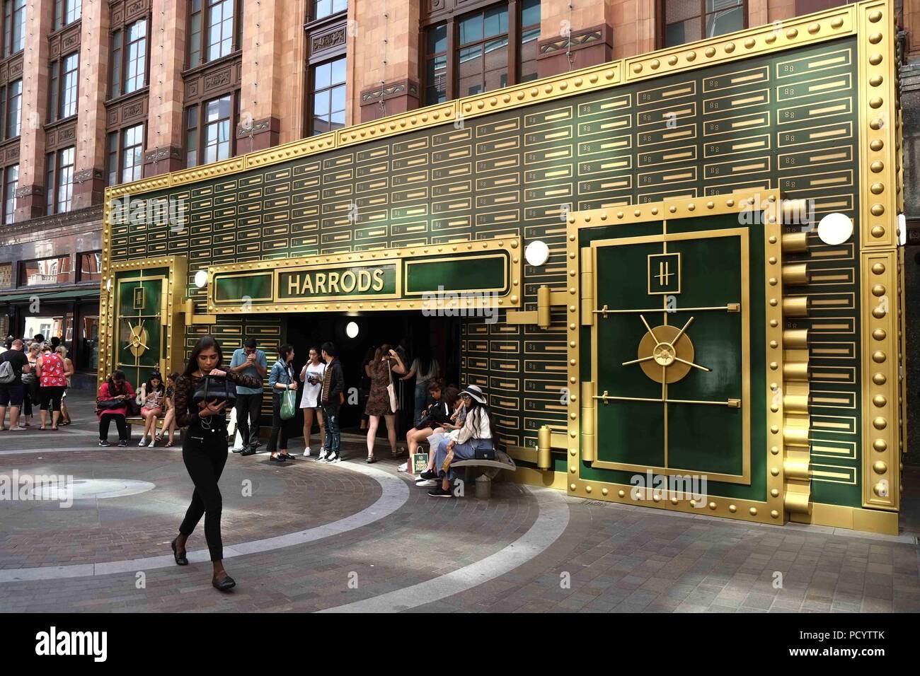 Harrods in Knightsbridge gets a temporary store frontage depicting a ...