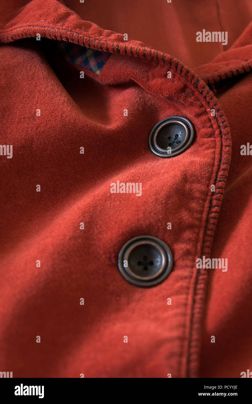 Close up view of buttons of old-fashioned red velvet jacket Stock Photo ...