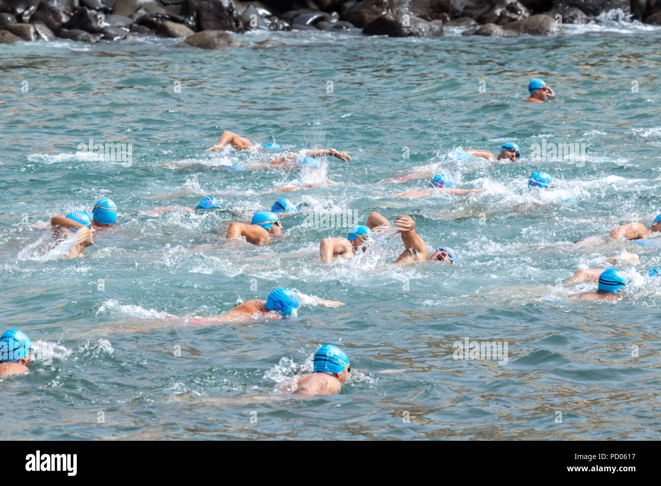SWIMMING-Cross at Bajamar municipality. Tenerife island Stock Photo - Alamy