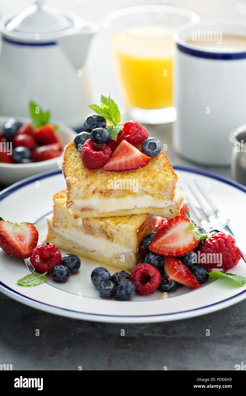 Baked french toast with cream cheese filling Stock Photo - Alamy