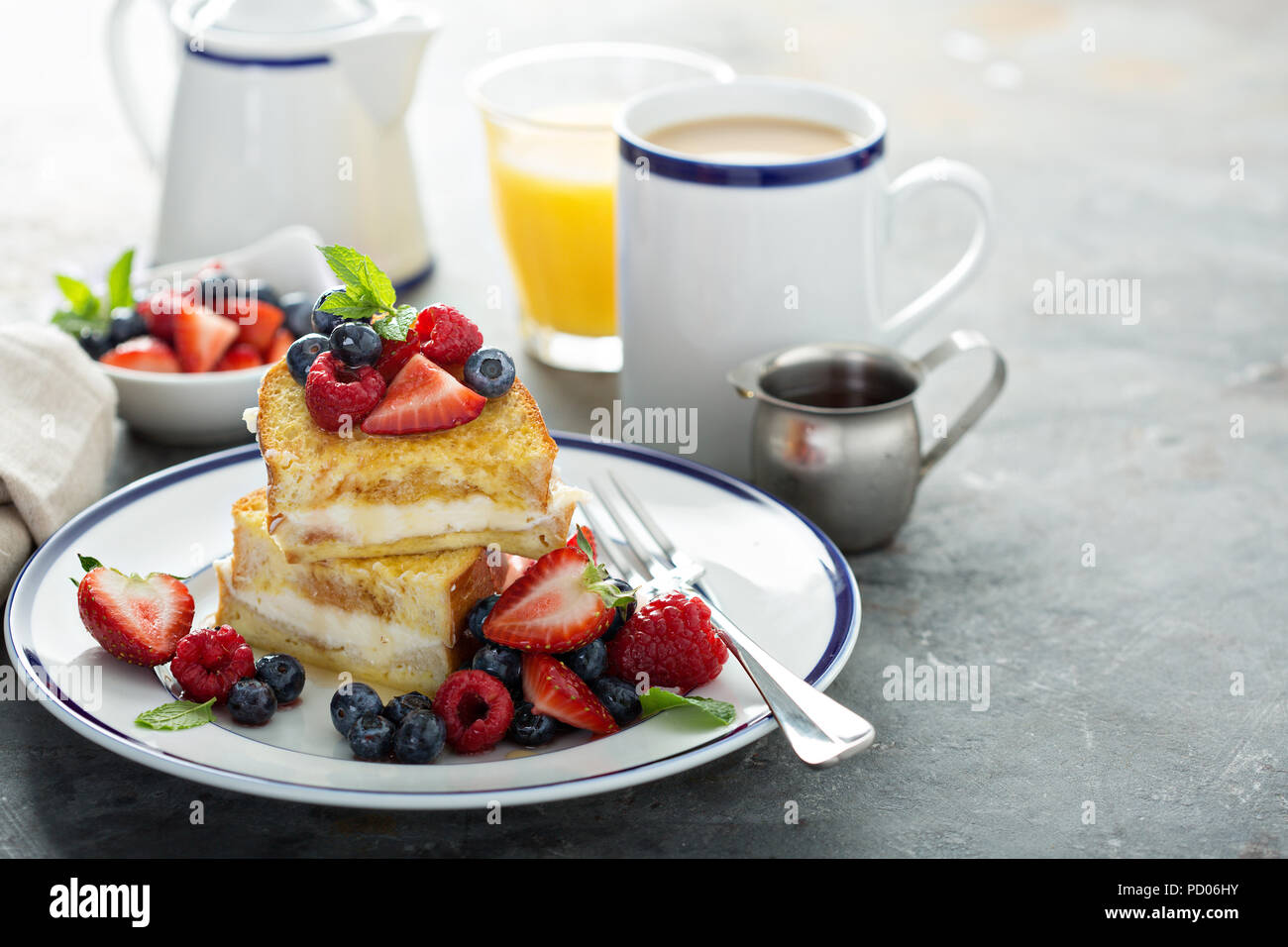Baked french toast with cream cheese filling Stock Photo - Alamy