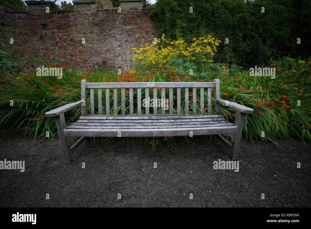Flower garden bench hi-res stock photography and images - Alamy