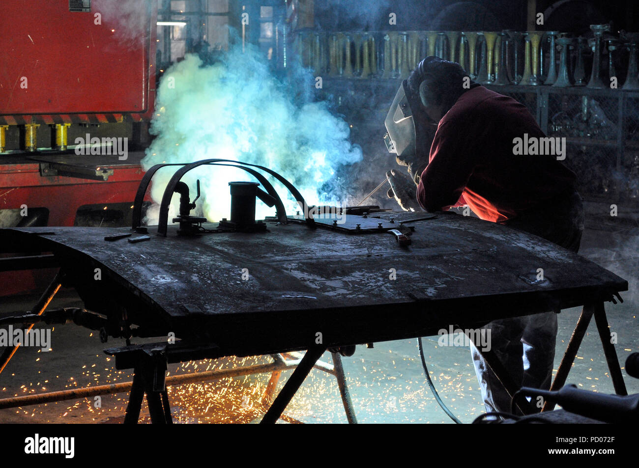 Welder working in machine shop hi-res stock photography and images - Alamy