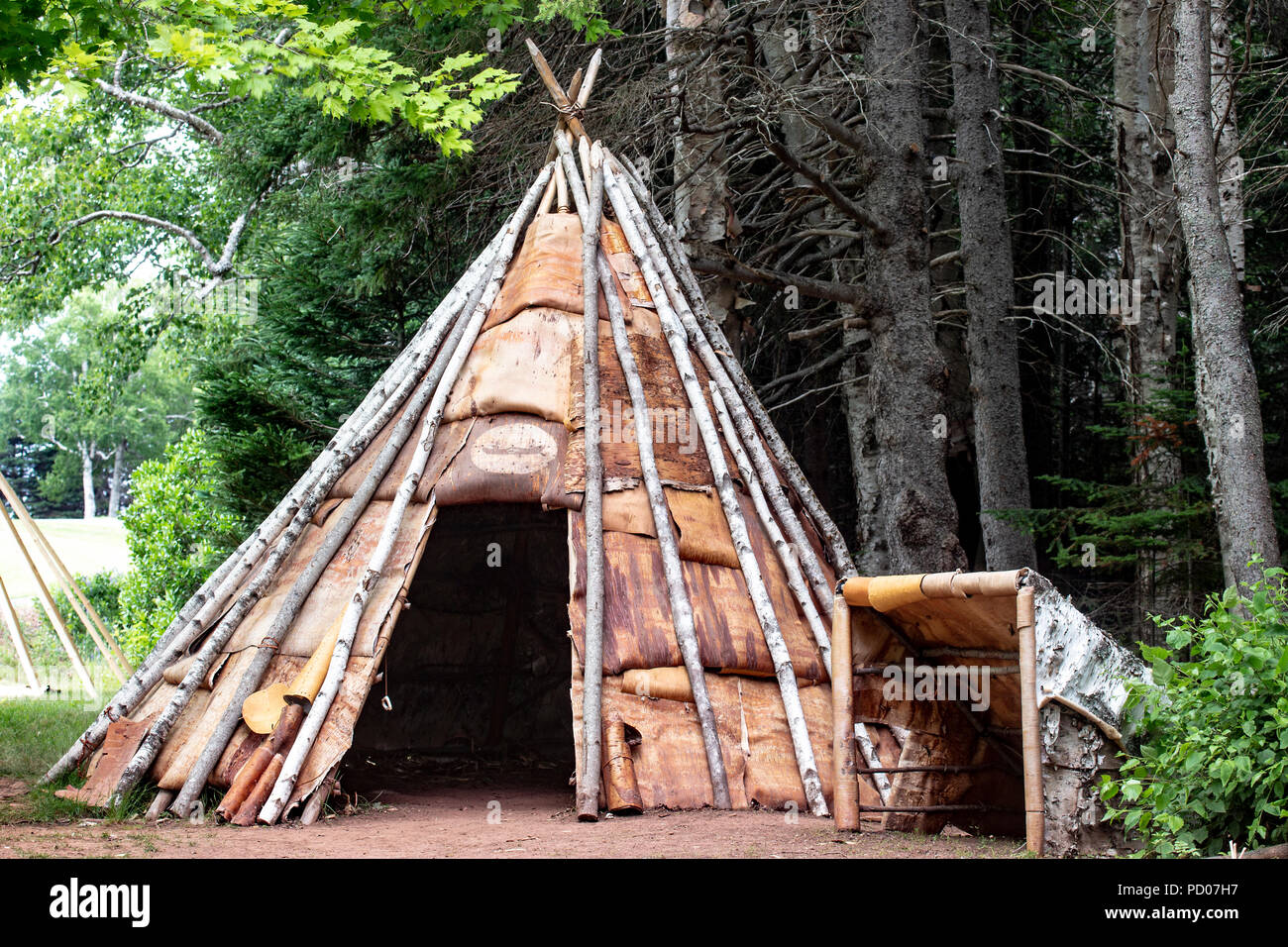 Canadian First Nations wigwam and outdoor smoker at Fort Amherst ...