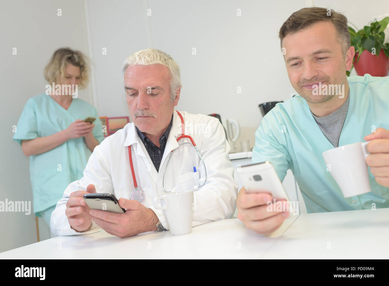 medical doctor team taking coffee break Stock Photo - Alamy