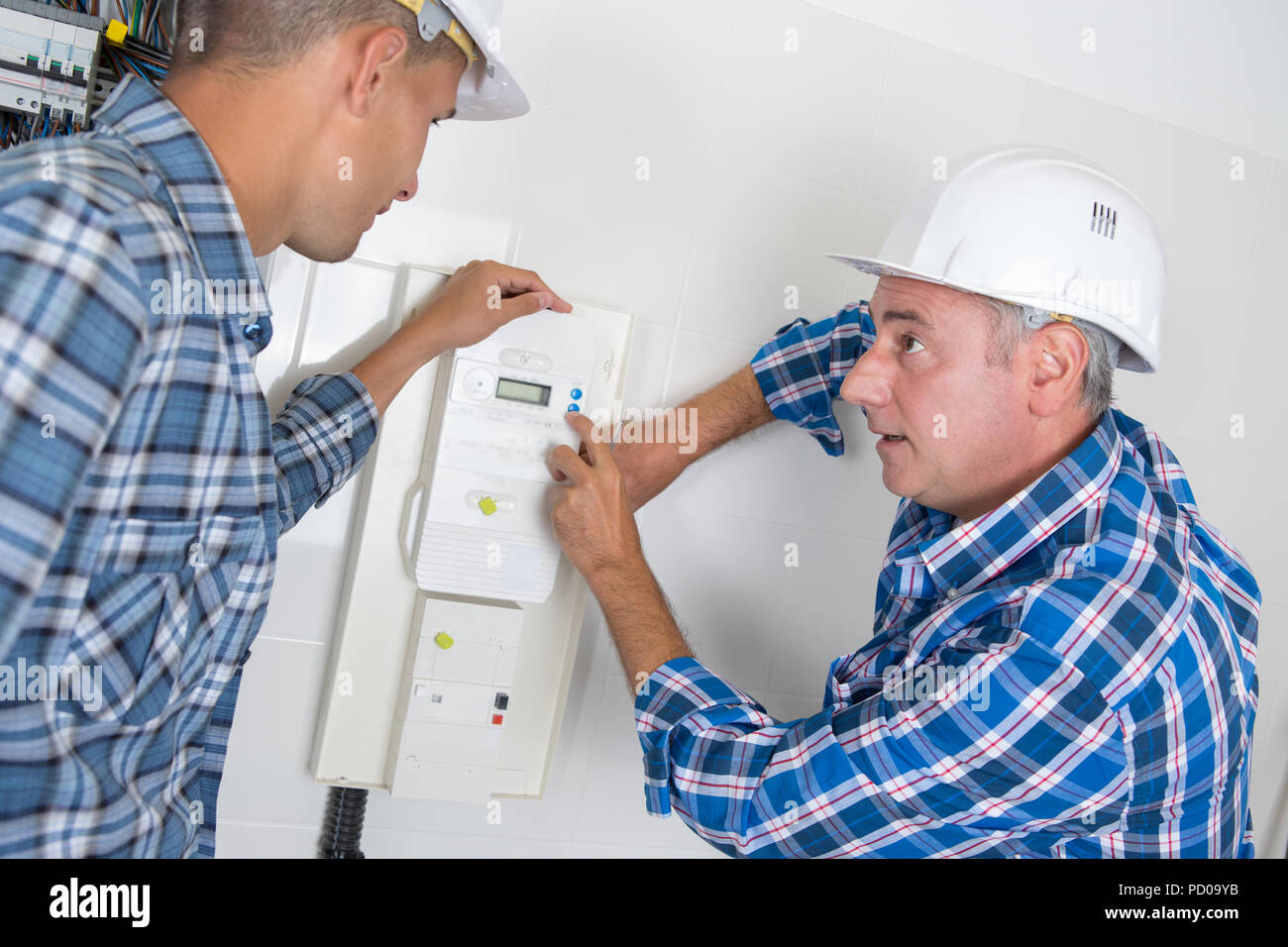 Man reading an electric meter hi-res stock photography and images - Alamy