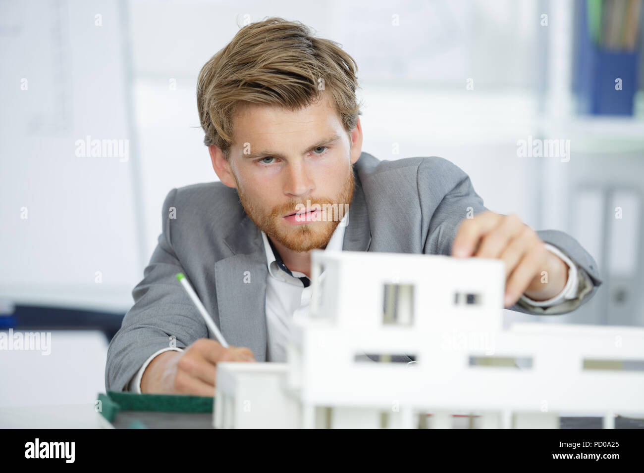 Assembling a house model hi-res stock photography and images - Alamy