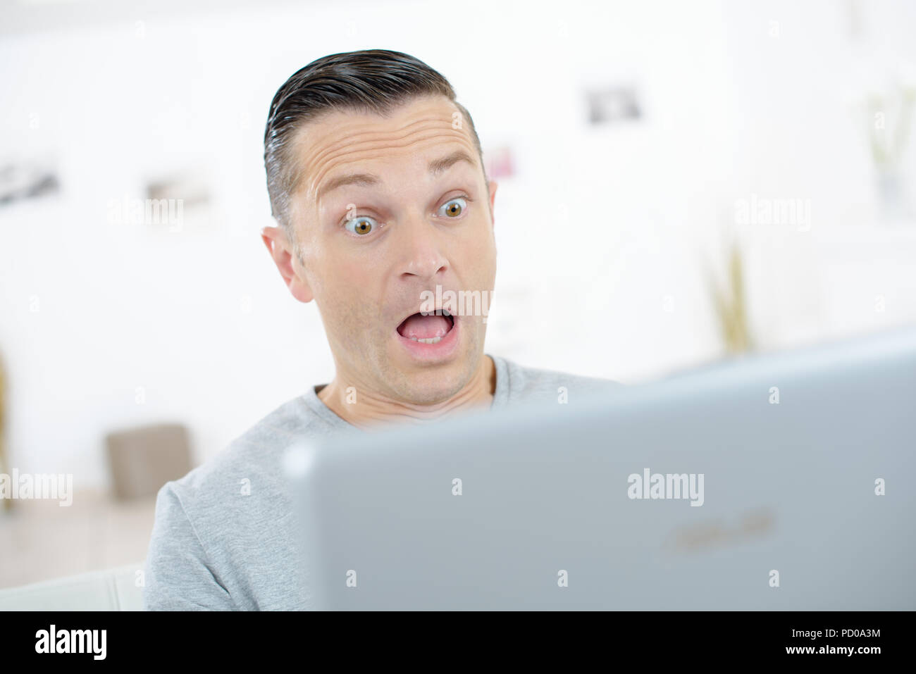 shocked businessman working on computer in his office Stock Photo - Alamy