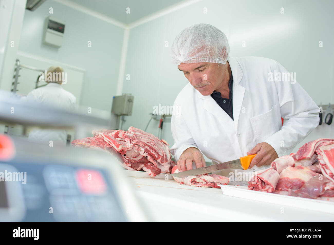 cutting the meat Stock Photo - Alamy