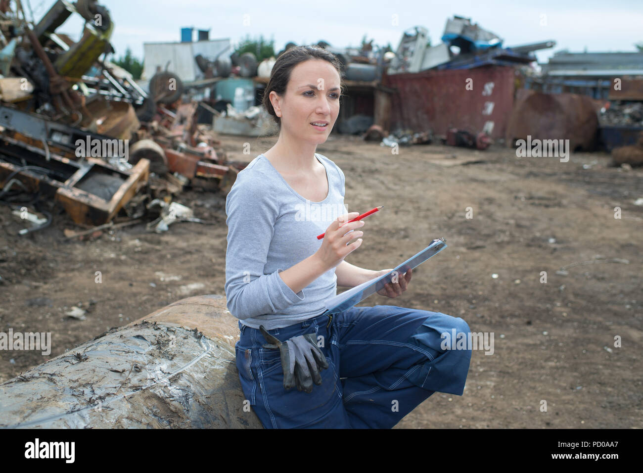 female junkyard worker Stock Photo - Alamy
