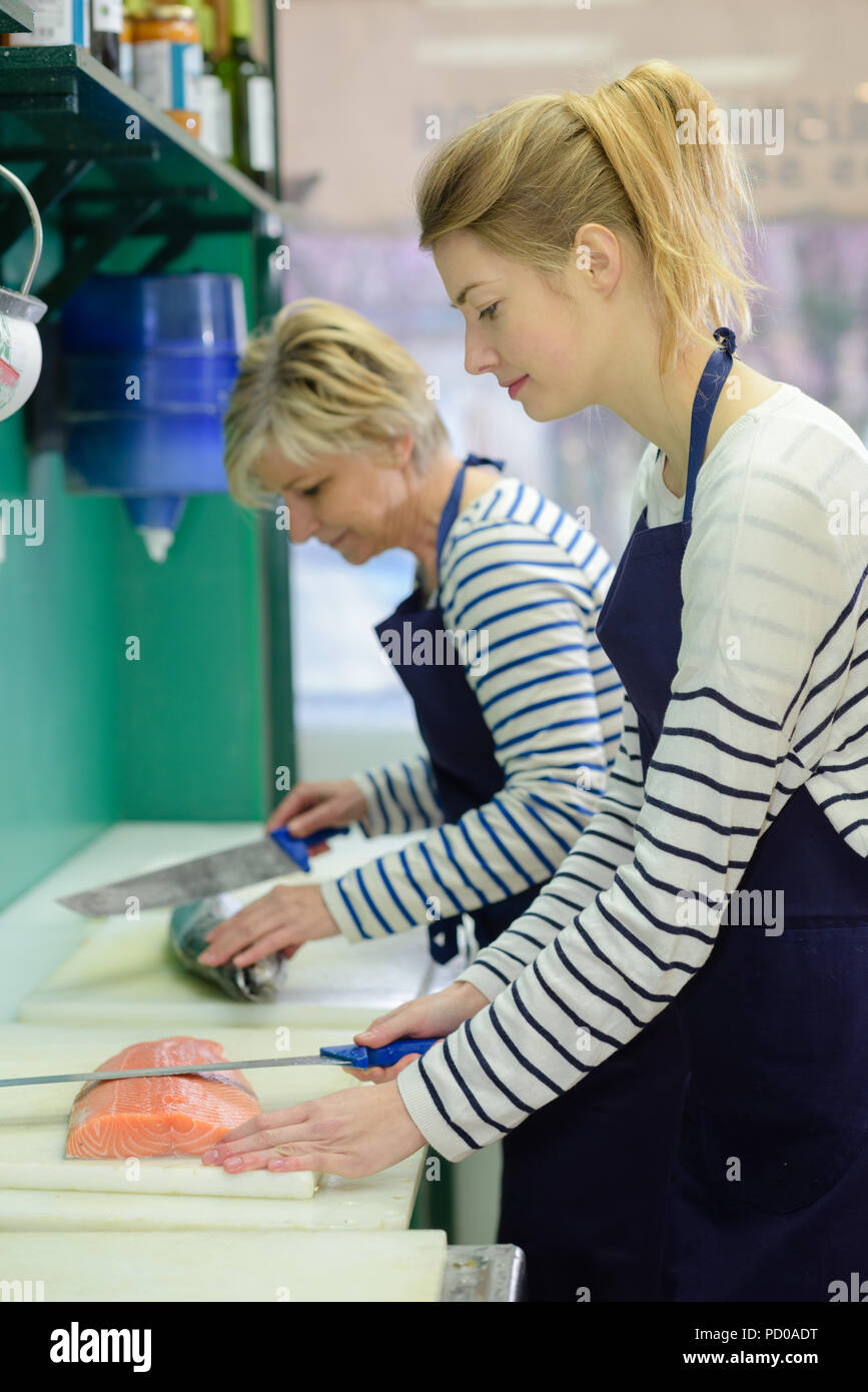 women preparing the fish Stock Photo - Alamy