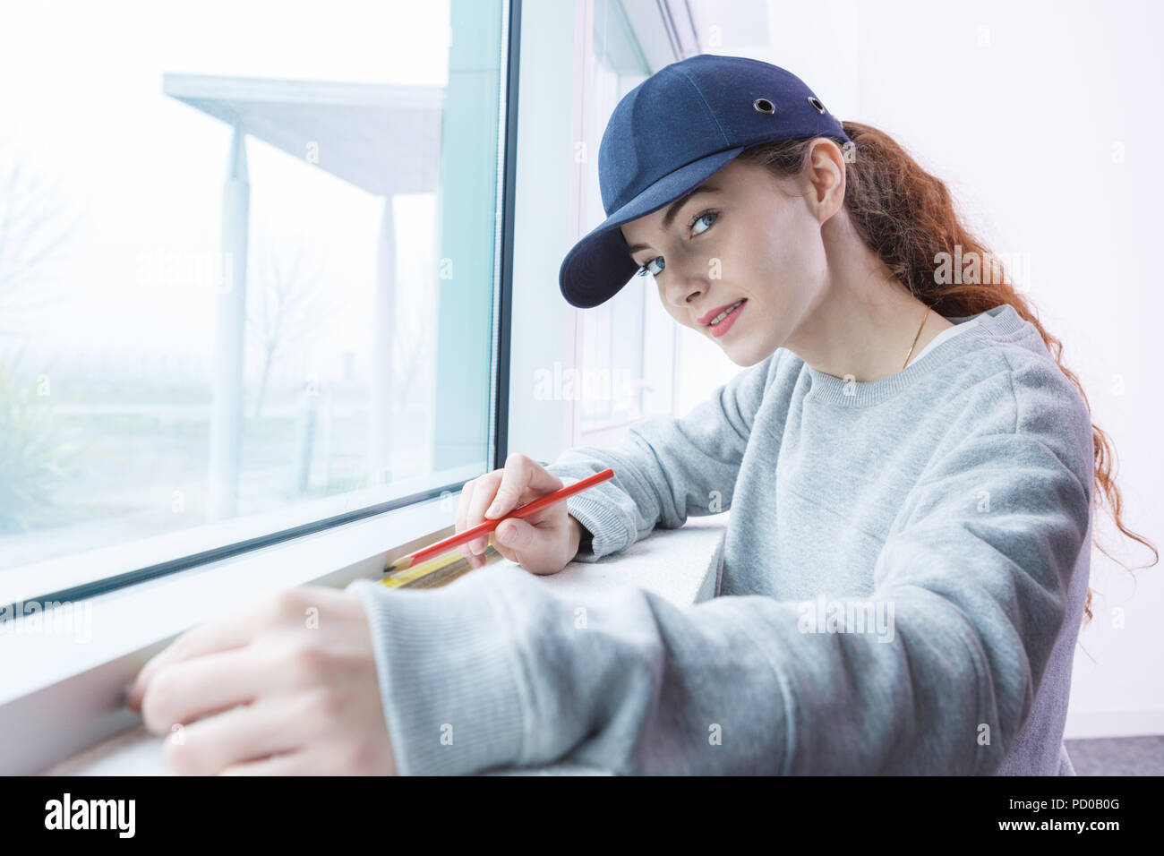 Woman double glazing hi-res stock photography and images - Alamy